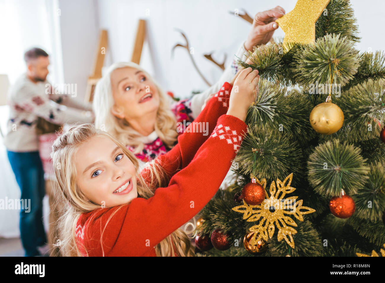 Happy grandmother granddaughter decorating hi-res stock photography and ...