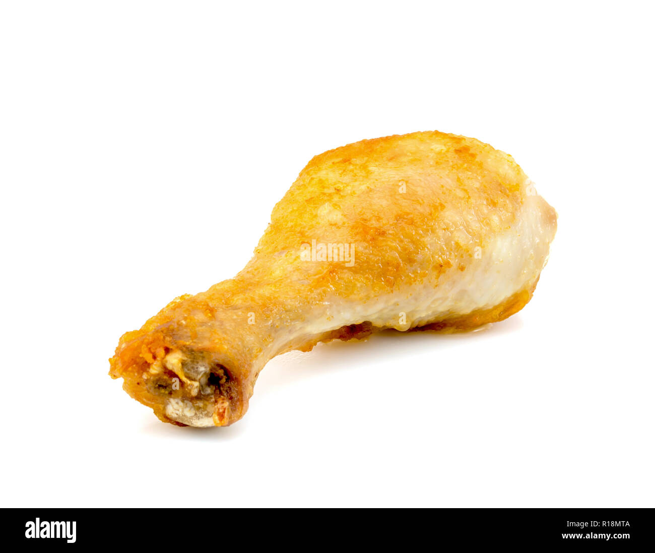 chicken leg close-up isolated on a white background Stock Photo - Alamy