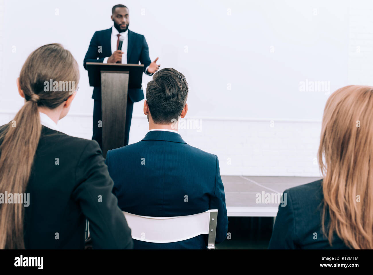 Young speaker man talking audience hi-res stock photography and images ...