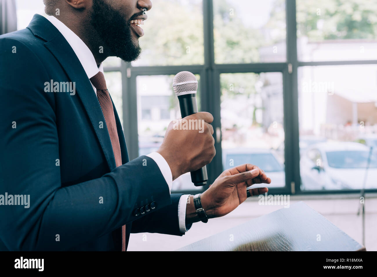 Young african man speech podium hi-res stock photography and images - Alamy