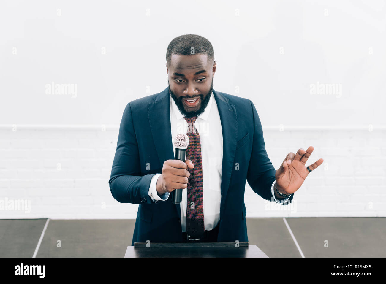 Young black man speech podium hi-res stock photography and images - Alamy