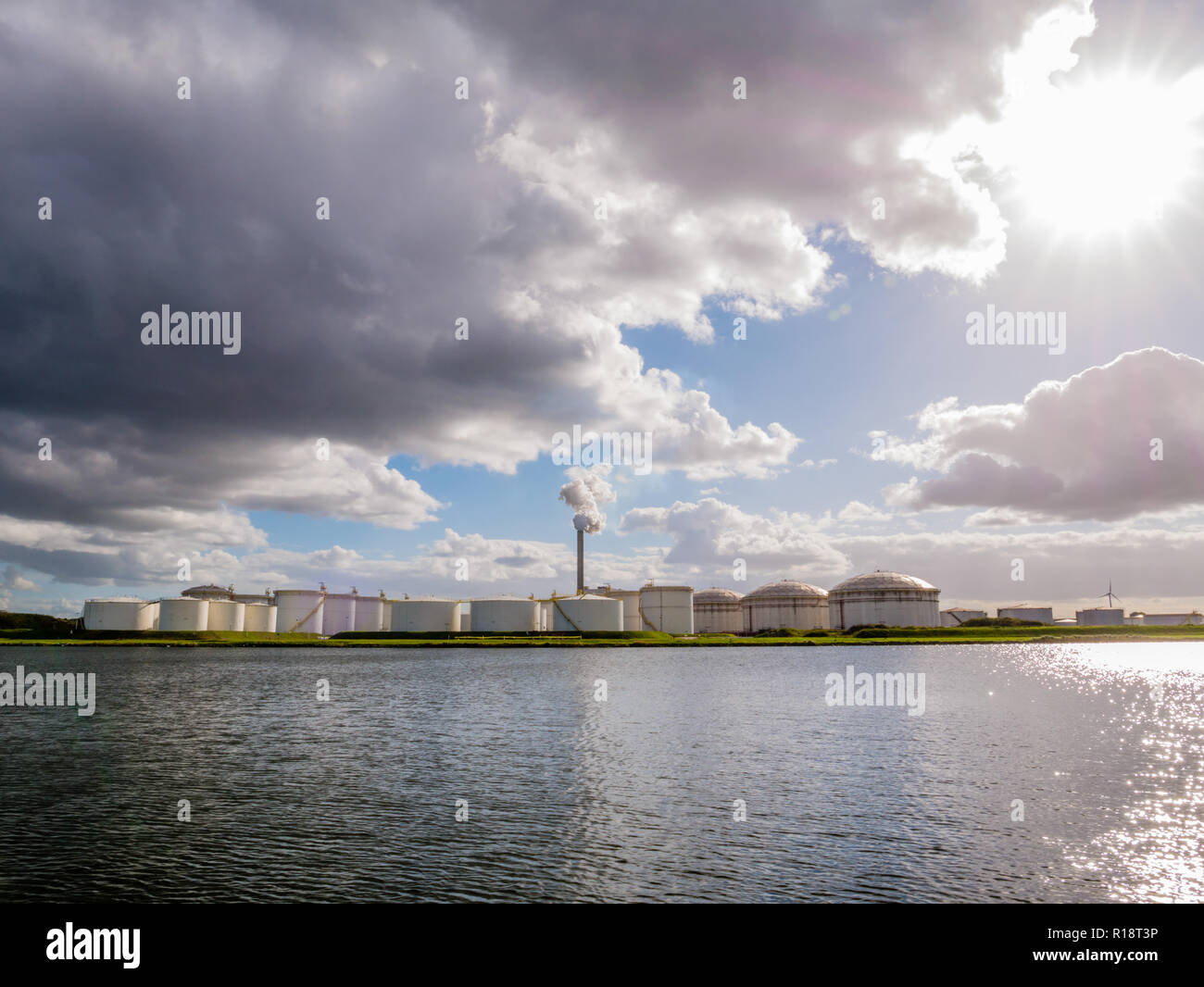 Oil storage tanks and exhaust stack of power station Hemweg in ...
