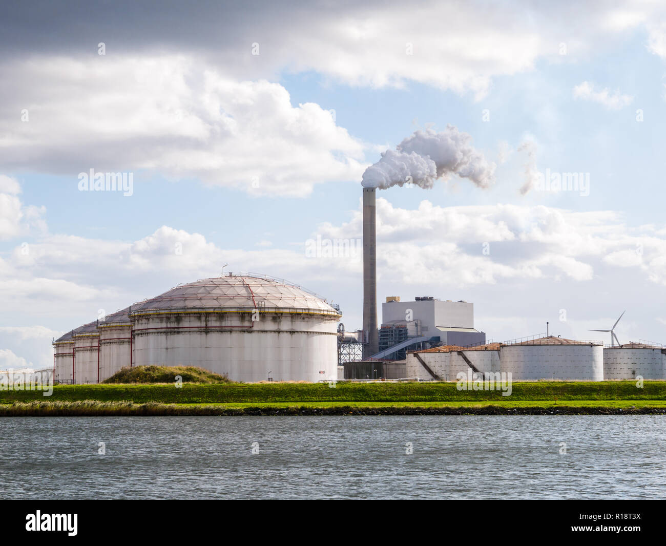 Oil storage tanks and exhaust stack of power station Hemweg in ...