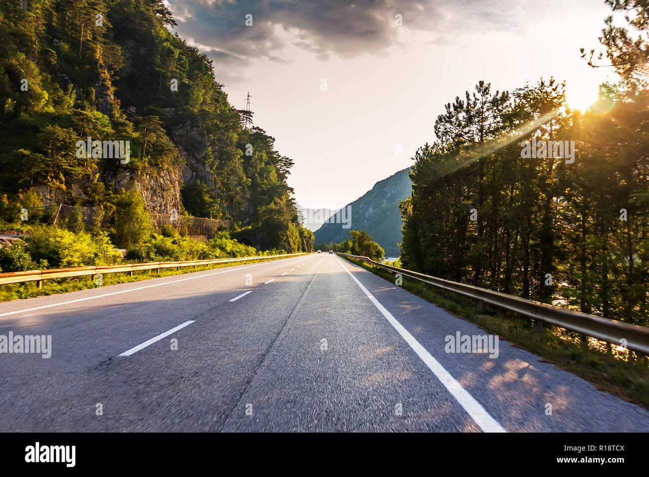 Asphalt road in alps hi-res stock photography and images - Alamy