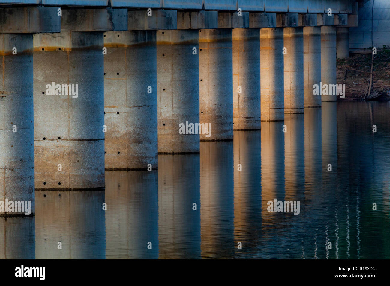 Bridge over the water at dusk in Laos Stock Photo - Alamy