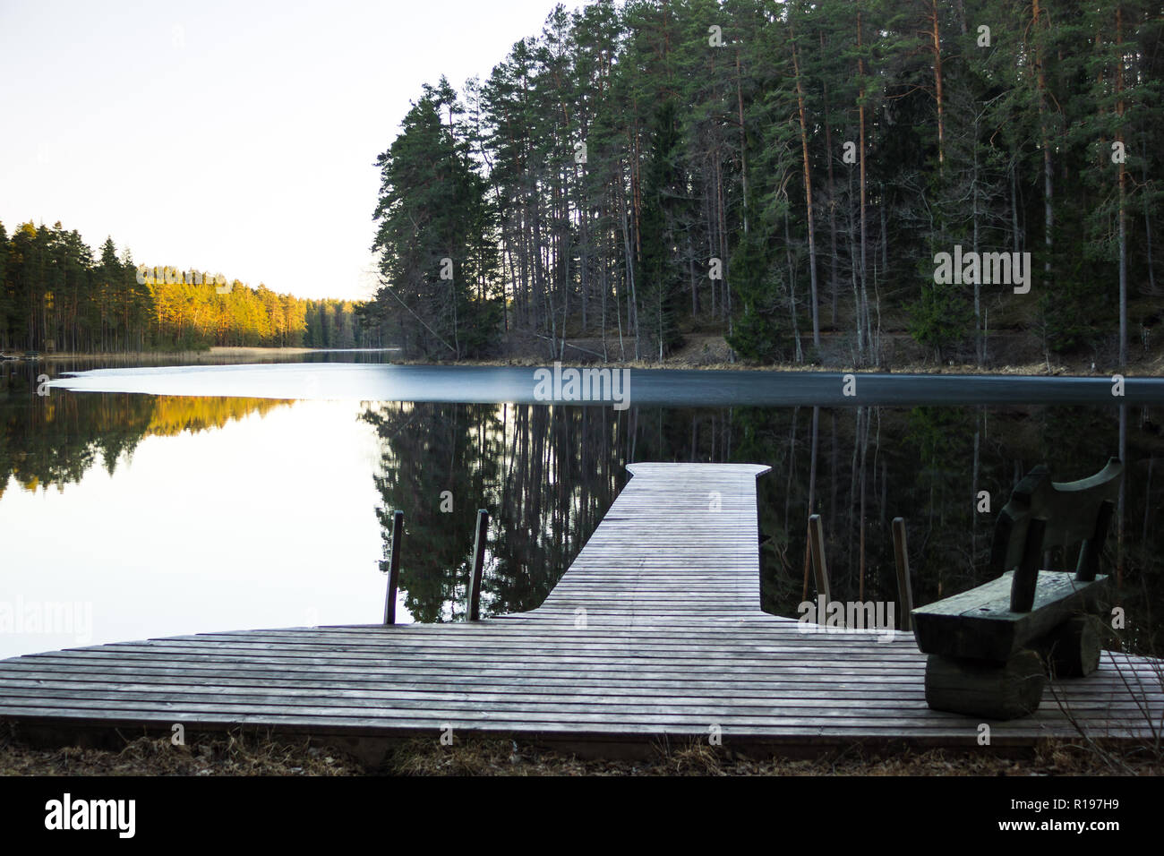 Early Spring Evening with the Footbridge on the Side of the Lake, with ...