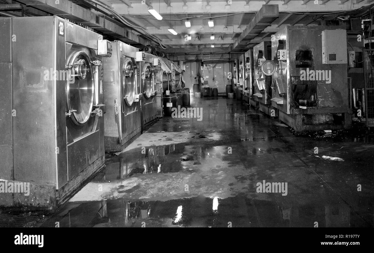 Black and white photograph of the laundry workshop with old washing ...