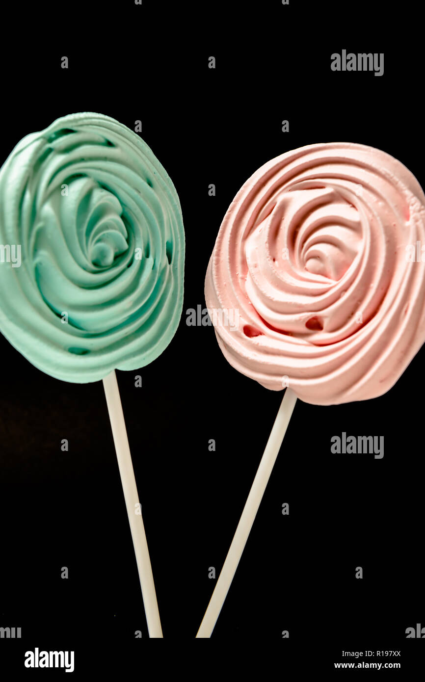 Meringue swirls on sticks Stock Photo - Alamy