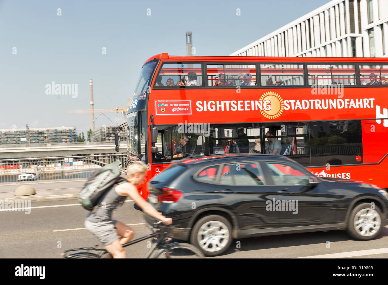 BERLIN, GERMANY - JULY 13, 2018: Tourists travel in Stadtrundfahrten ...