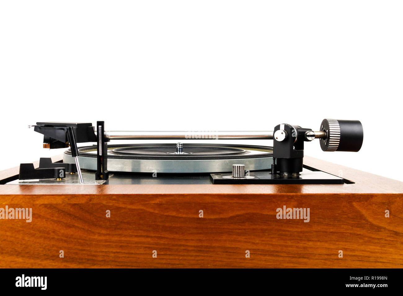 Side view of vintage turntable vinyl record player isolated on white ...