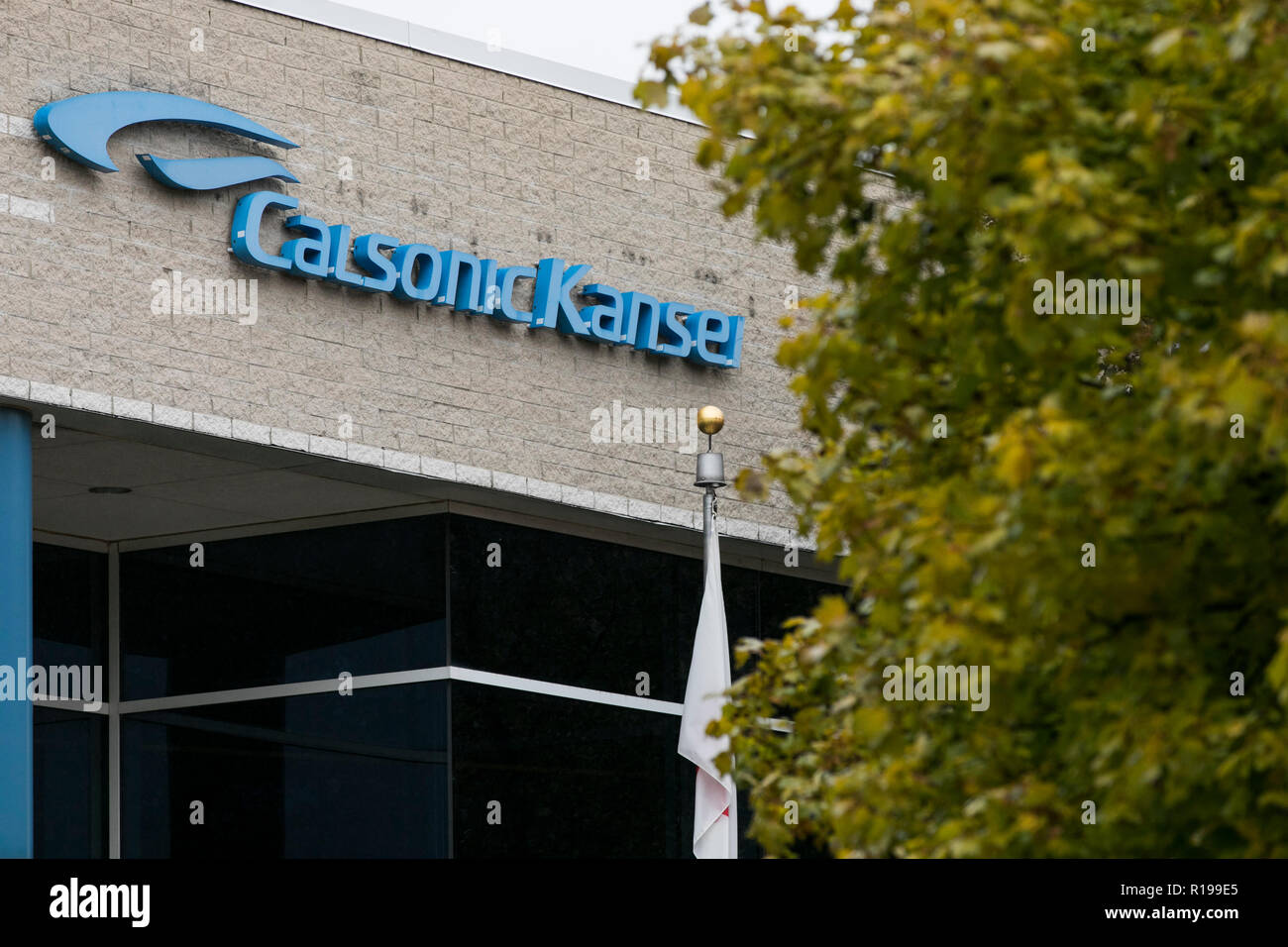 A logo sign outside of a facility occupied by Calsonic Kansei in ...