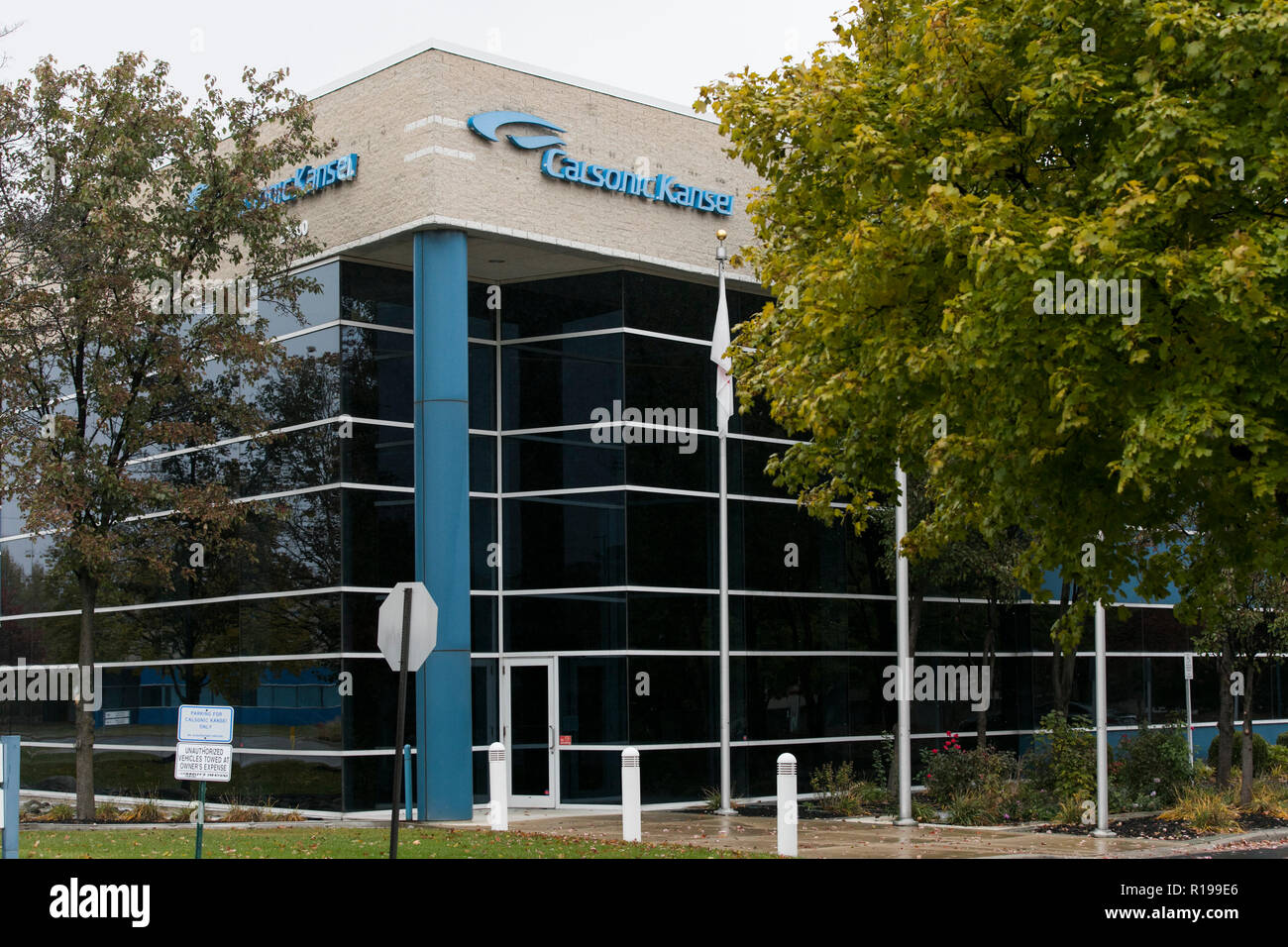 A logo sign outside of a facility occupied by Calsonic Kansei in ...