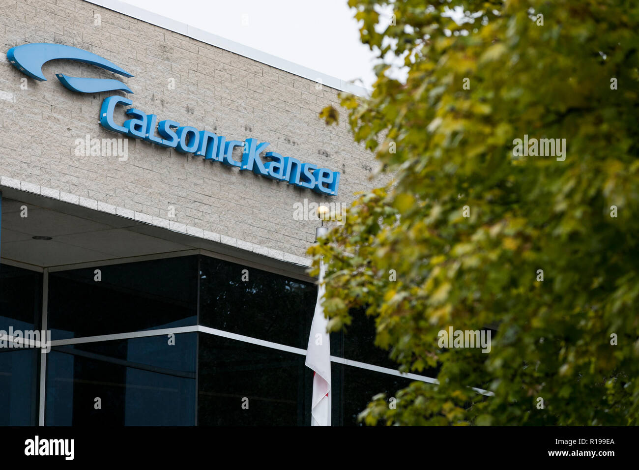 A logo sign outside of a facility occupied by Calsonic Kansei in ...