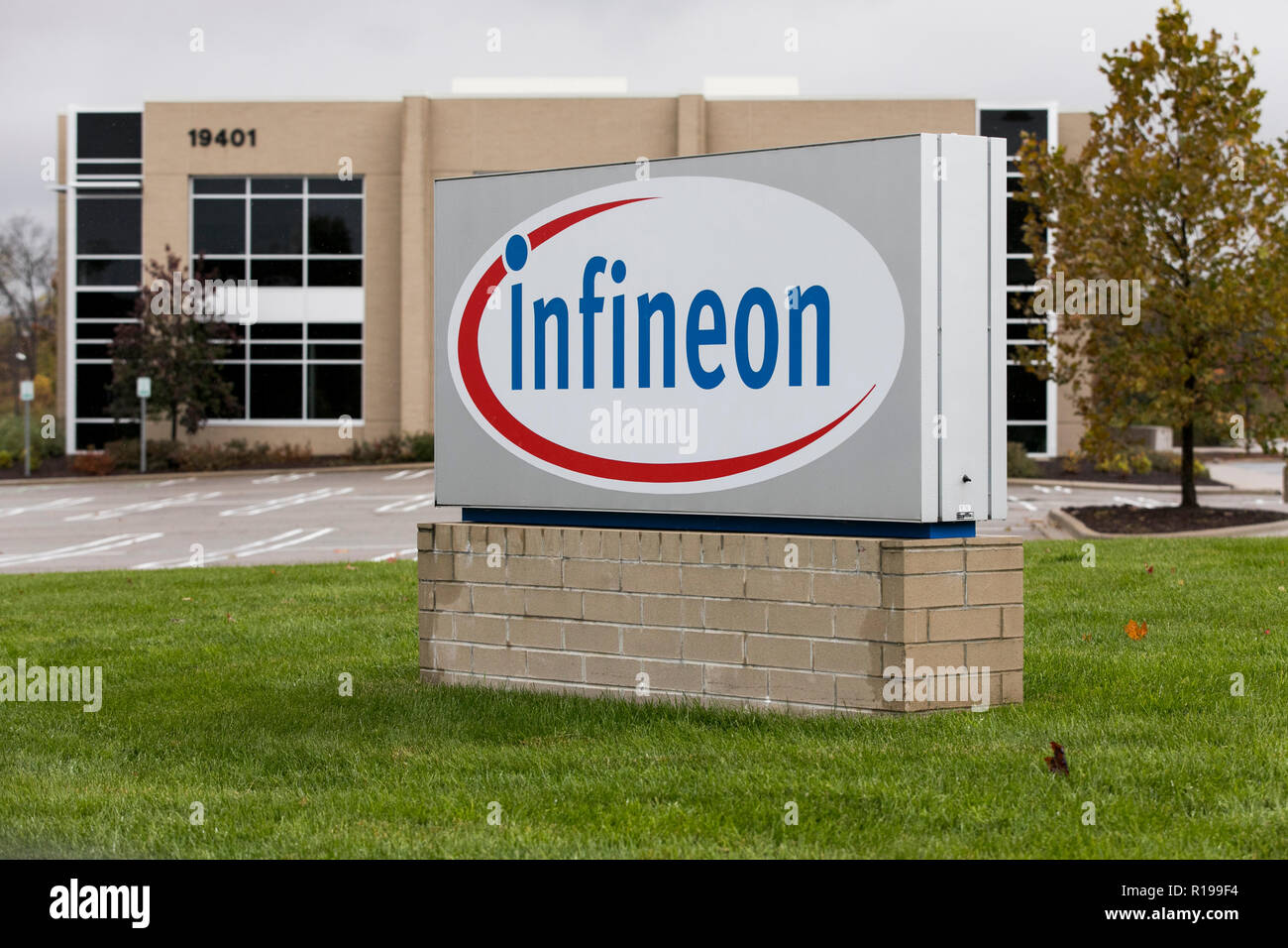A logo sign outside of a facility occupied by Infineon Technologies in ...