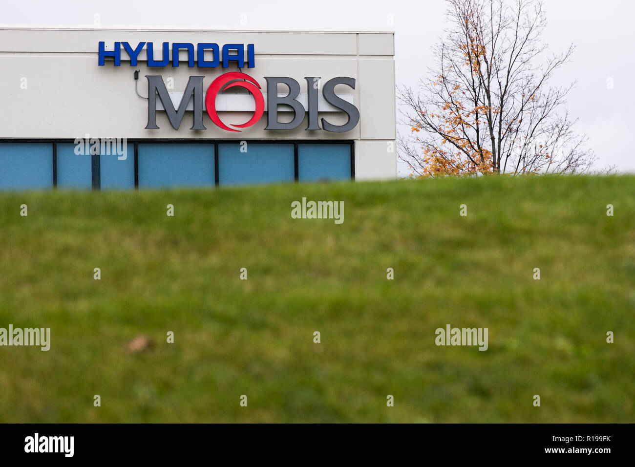 A logo sign outside of a facility occupied by Hyundai Mobis in Plymouth ...
