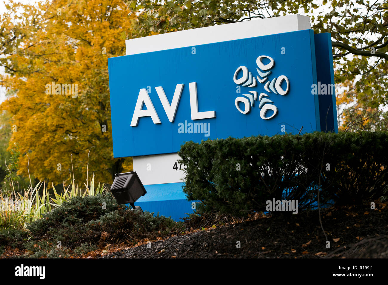 A logo sign outside of a facility occupied by AVL (Anstalt für ...
