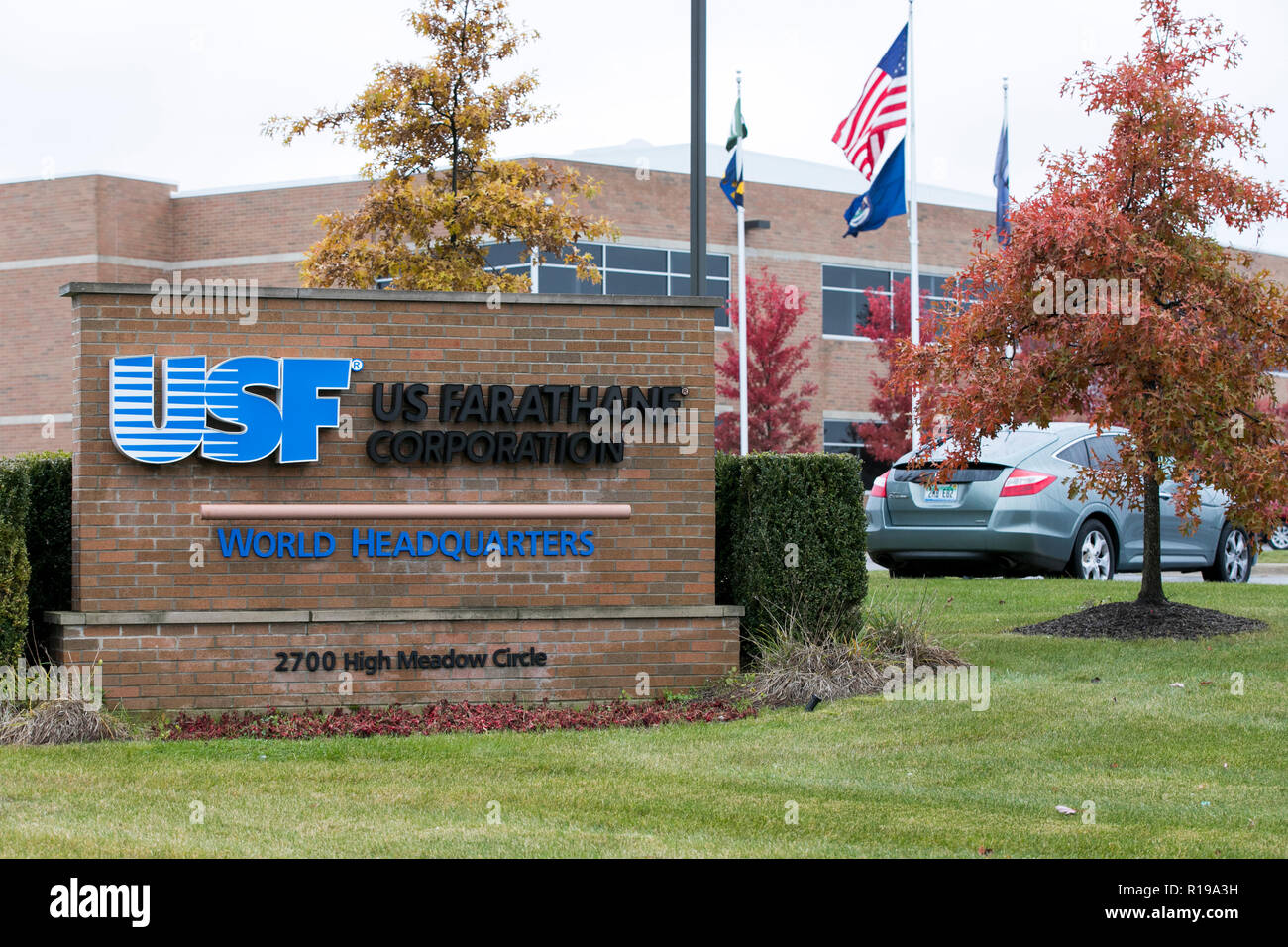 A logo sign outside of the headquarters of the US Farathane Corporation ...