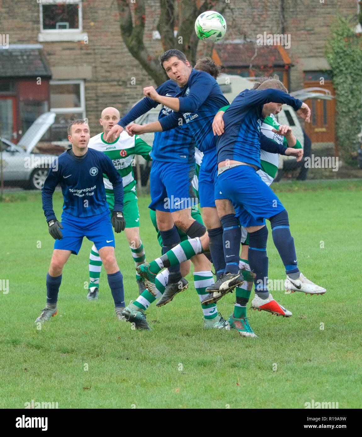 Football action from an amateur match between Blazing Rag and Dronfield ...