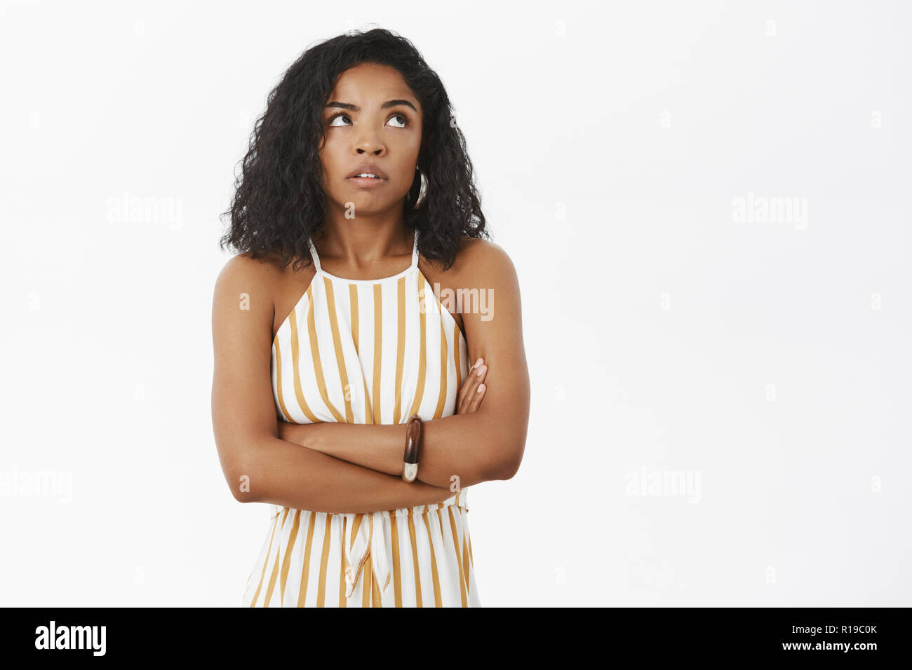 Arrogant and impatient young attractive african american woman in ...