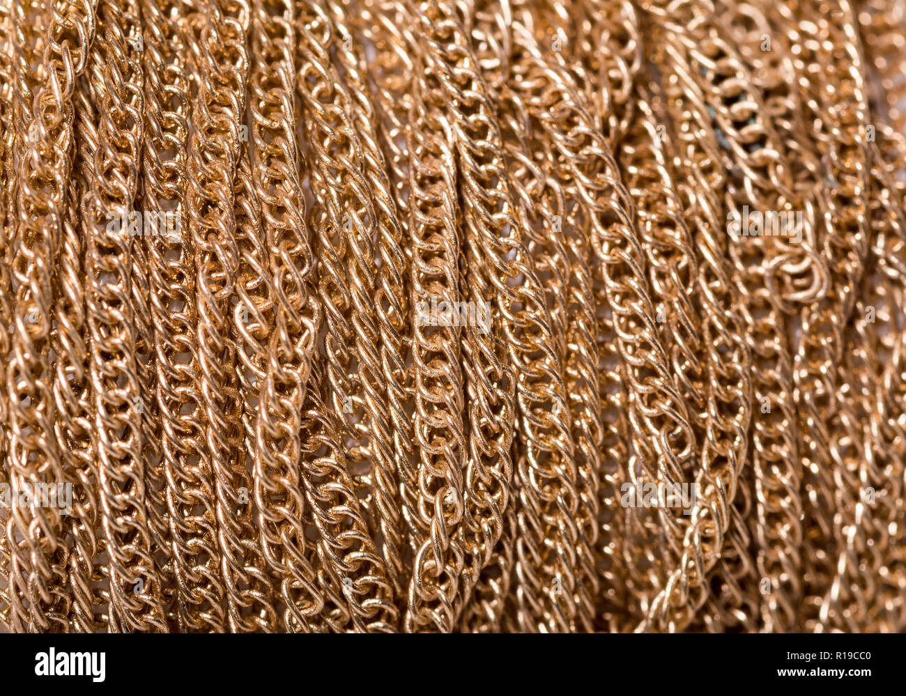 Gold chains texture macro background Stock Photo - Alamy