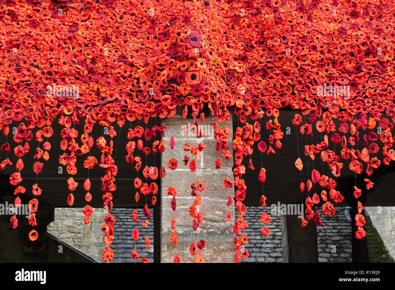 Clock tower war memorial in the centre of the Cotswold town of ...