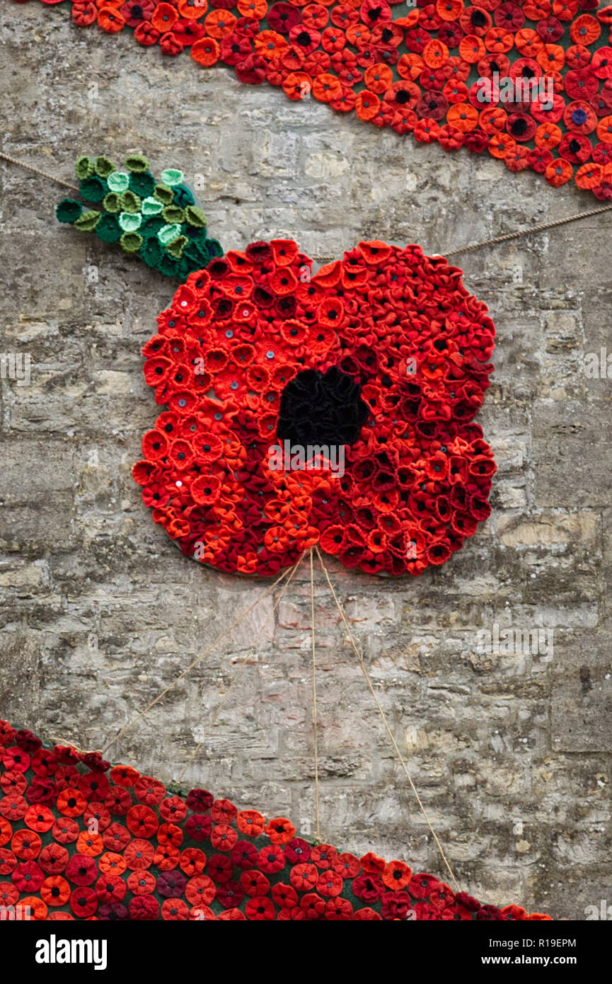 Clock tower war memorial in the centre of the Cotswold town of ...