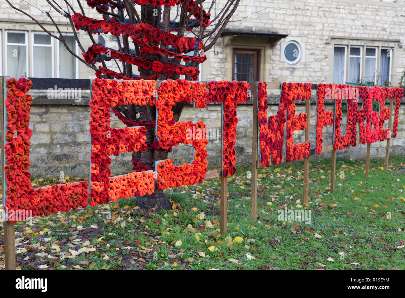 Clock tower war memorial in the centre of the Cotswold town of ...