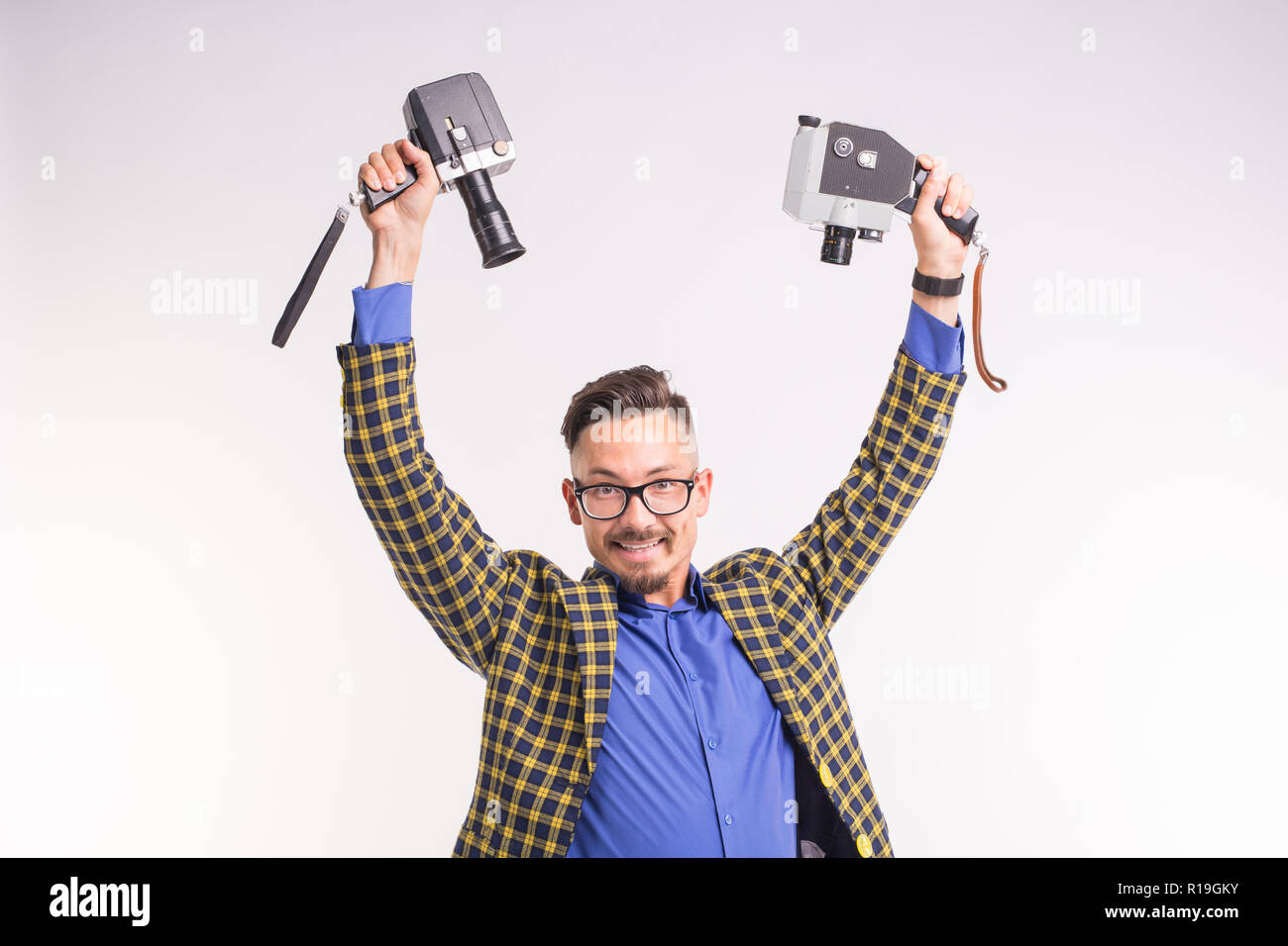 Technologies, photographing and people concept - portrait of funny ...