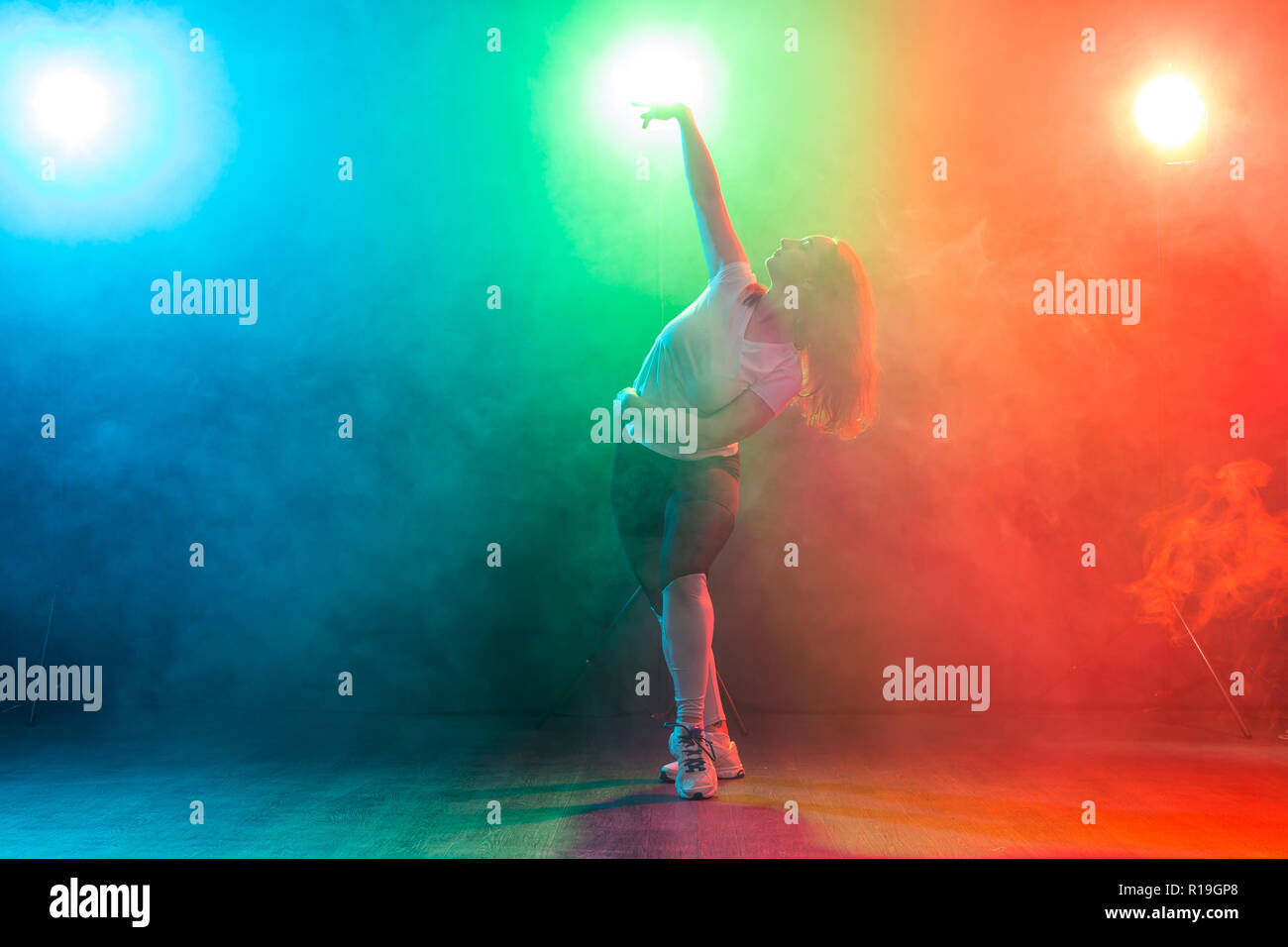 People and dancing concept - European young woman dancing jazz funk ...