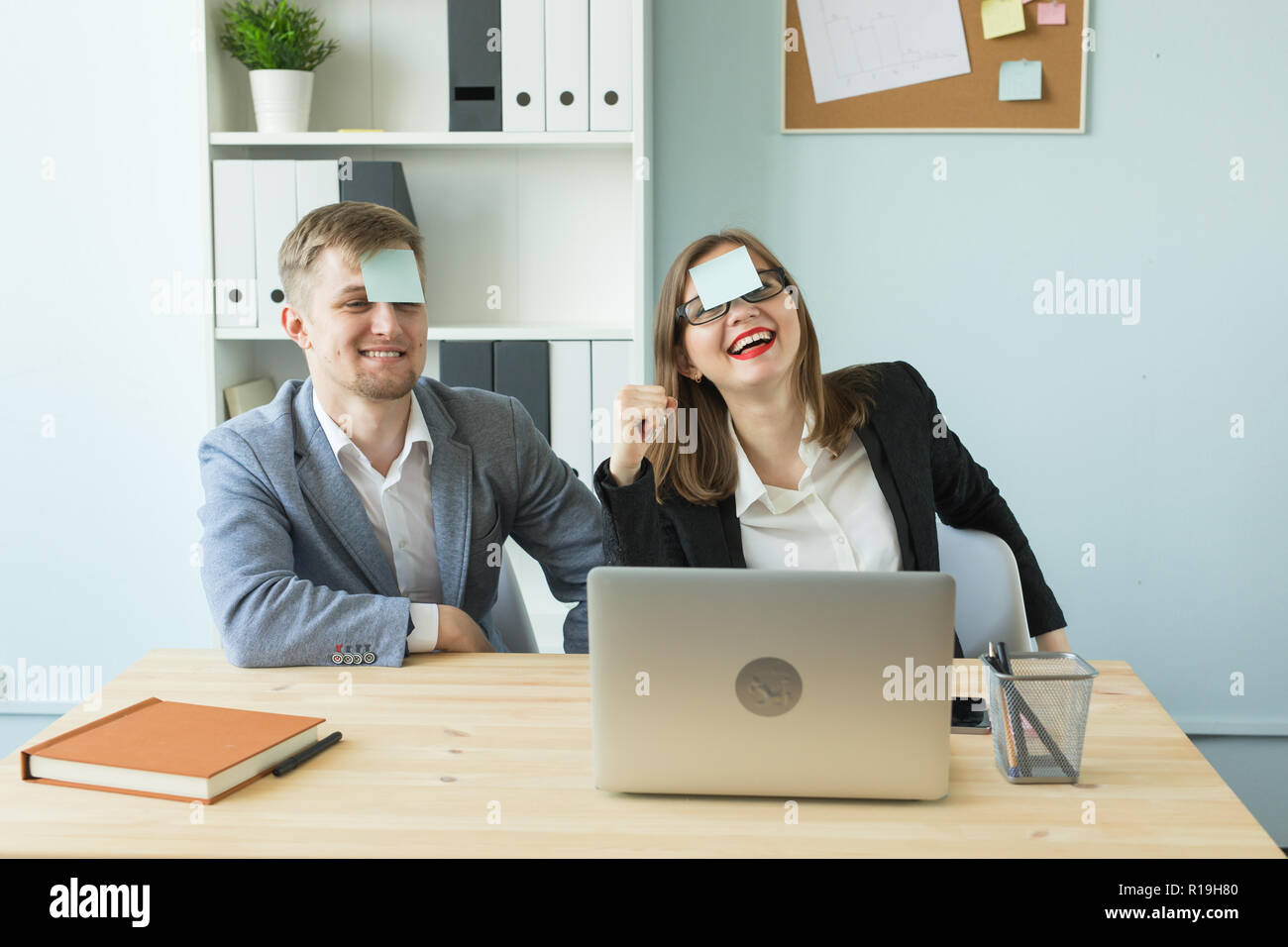 Business, break and people concept - Cheerful man and woman playing ...