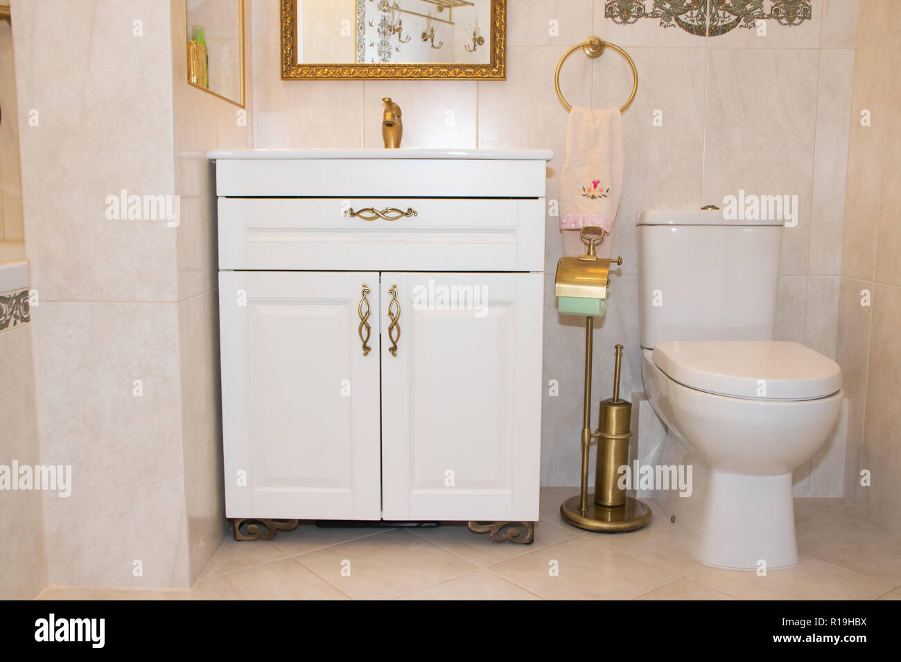Bright toilet room. The interior of the light toilet room. White toilet ...