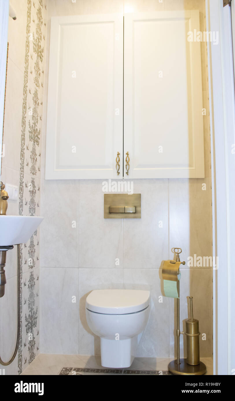 Bright toilet room. The interior of the light toilet room. White toilet ...