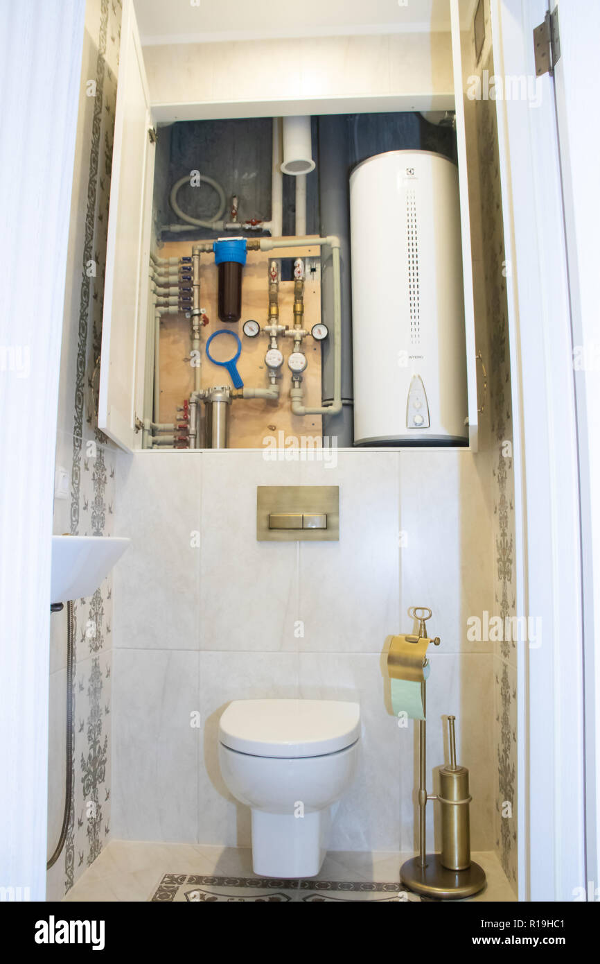 Bright toilet room. The interior of the light toilet room. White toilet ...