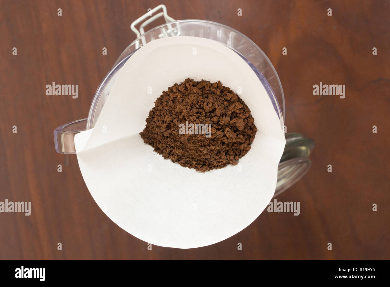 Drip coffee with paper filter tool on wood background Stock Photo - Alamy