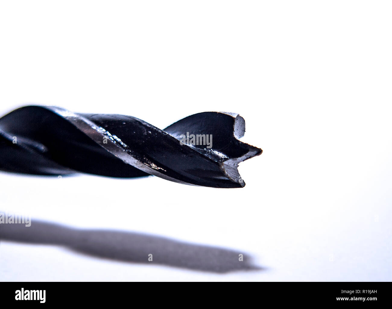 Drill bit with shadow isolated on white background Stock Photo - Alamy