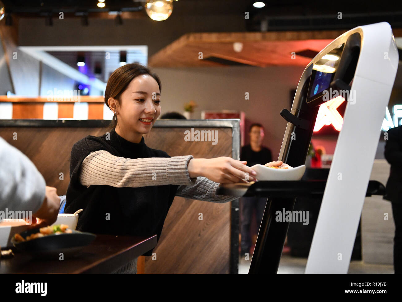 Tianjin. 10th Nov, 2018. A robot serves food at a smart restaurant ...