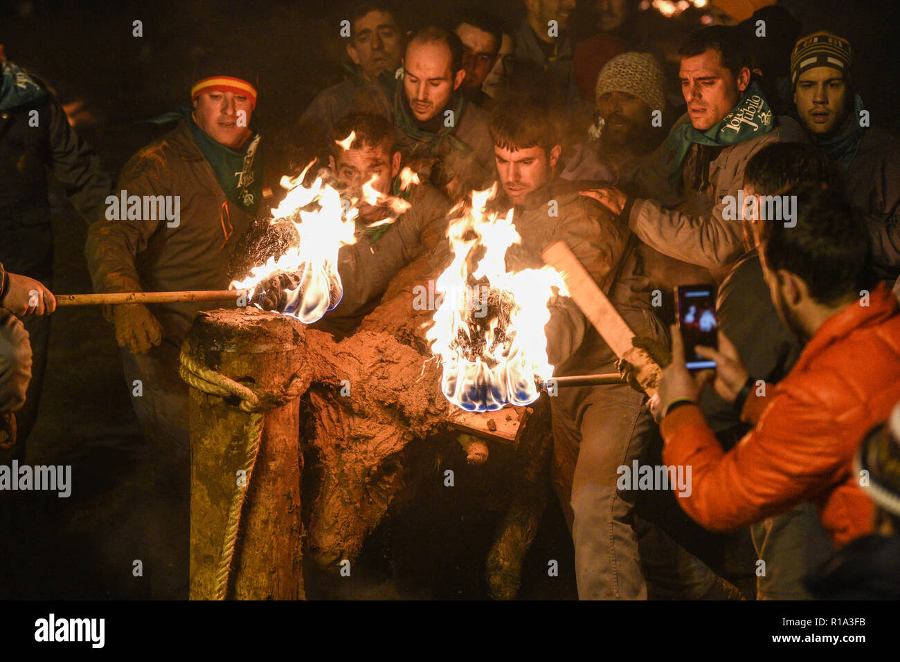 Revelers set bull's horns on fire during the 'Toro de Jubilo' Fire Bull ...