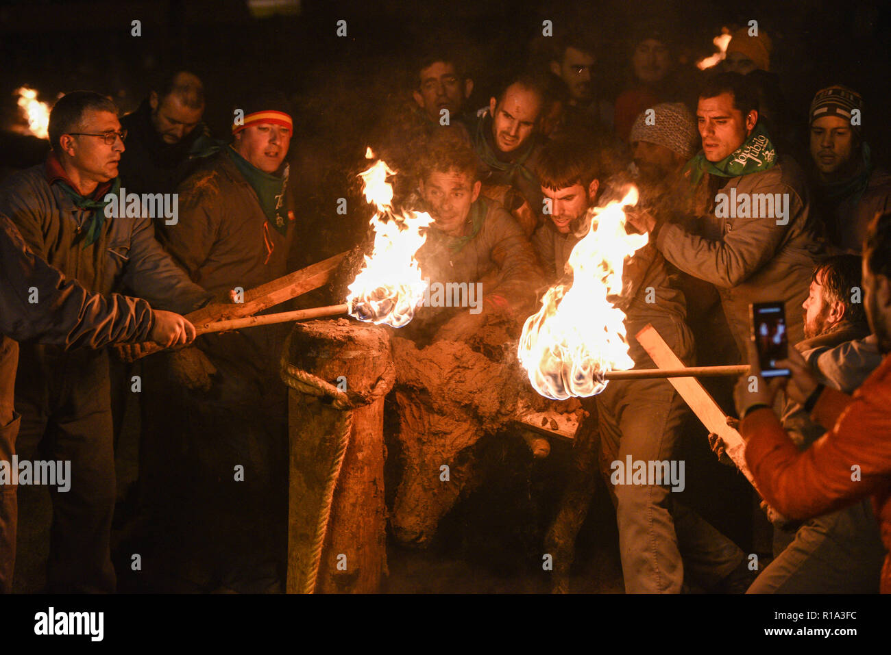 Revelers set bull's horns on fire during the 'Toro de Jubilo' Fire Bull ...