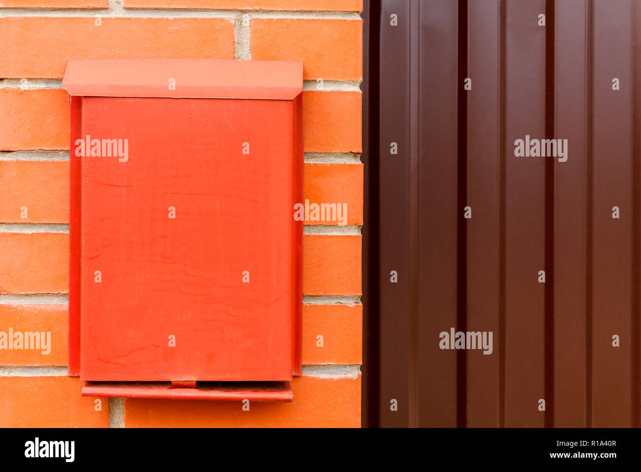 A beautiful mailbox hangs waiting for newspapers, parcels and letters ...