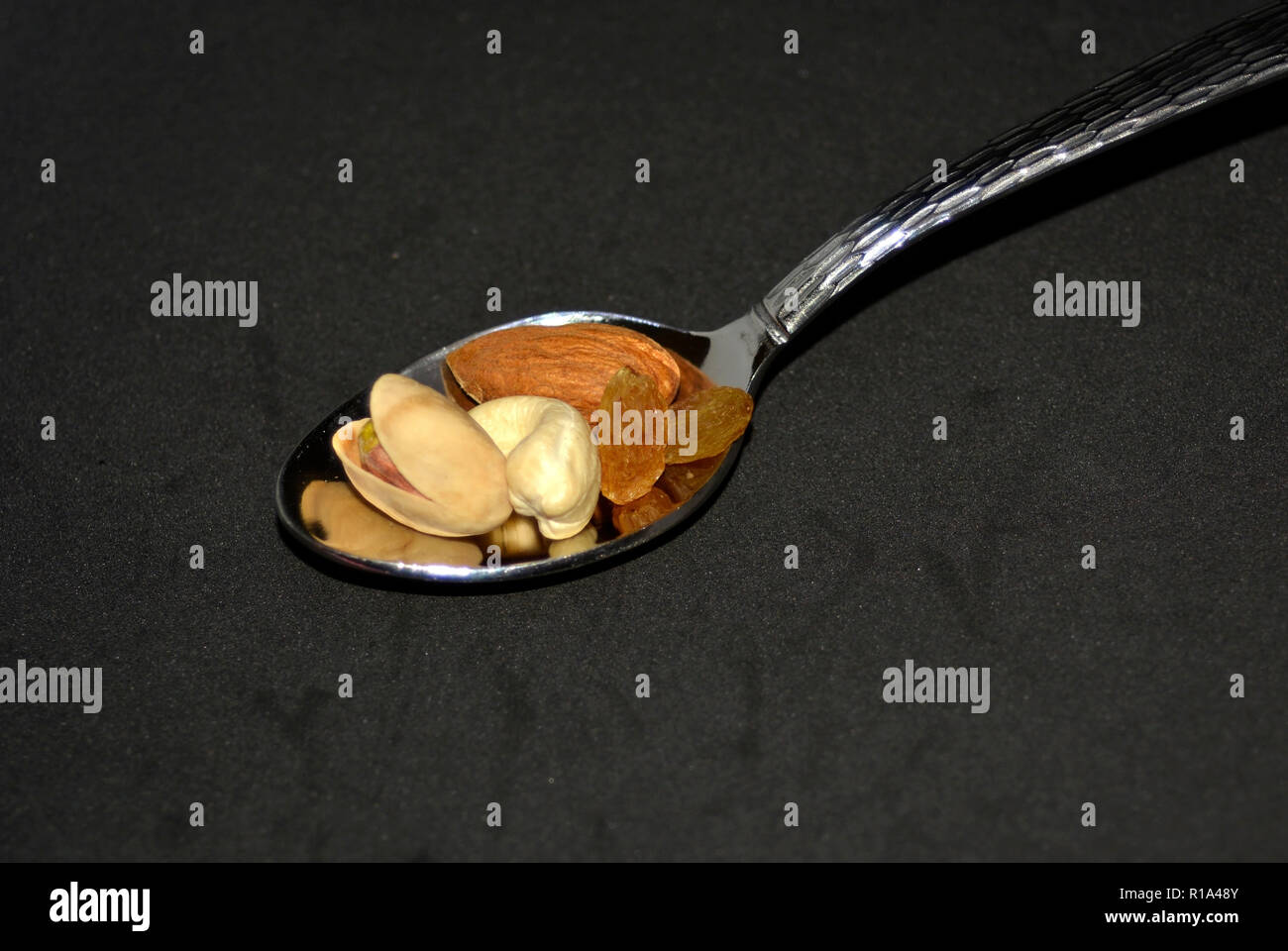 Dry Fruits in Spoon Stock Photo - Alamy