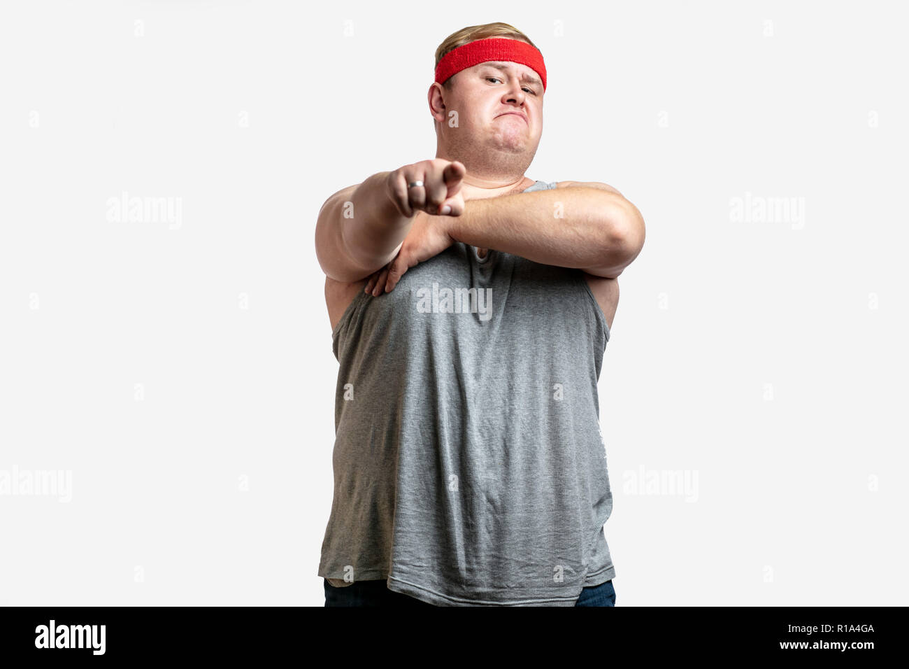 Fat proud young man making a gesture isolated on white background Stock ...