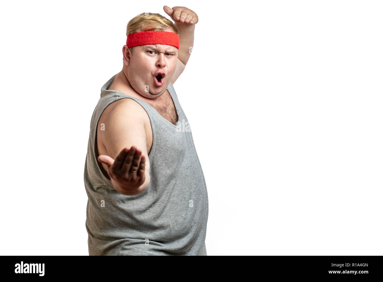Fat young man making a gesture pointing to himself isolated on white ...