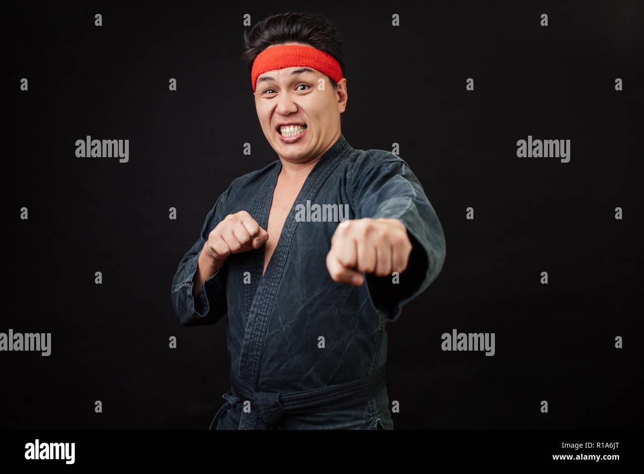 puzzled man has seen strong and muscular opponent Stock Photo - Alamy
