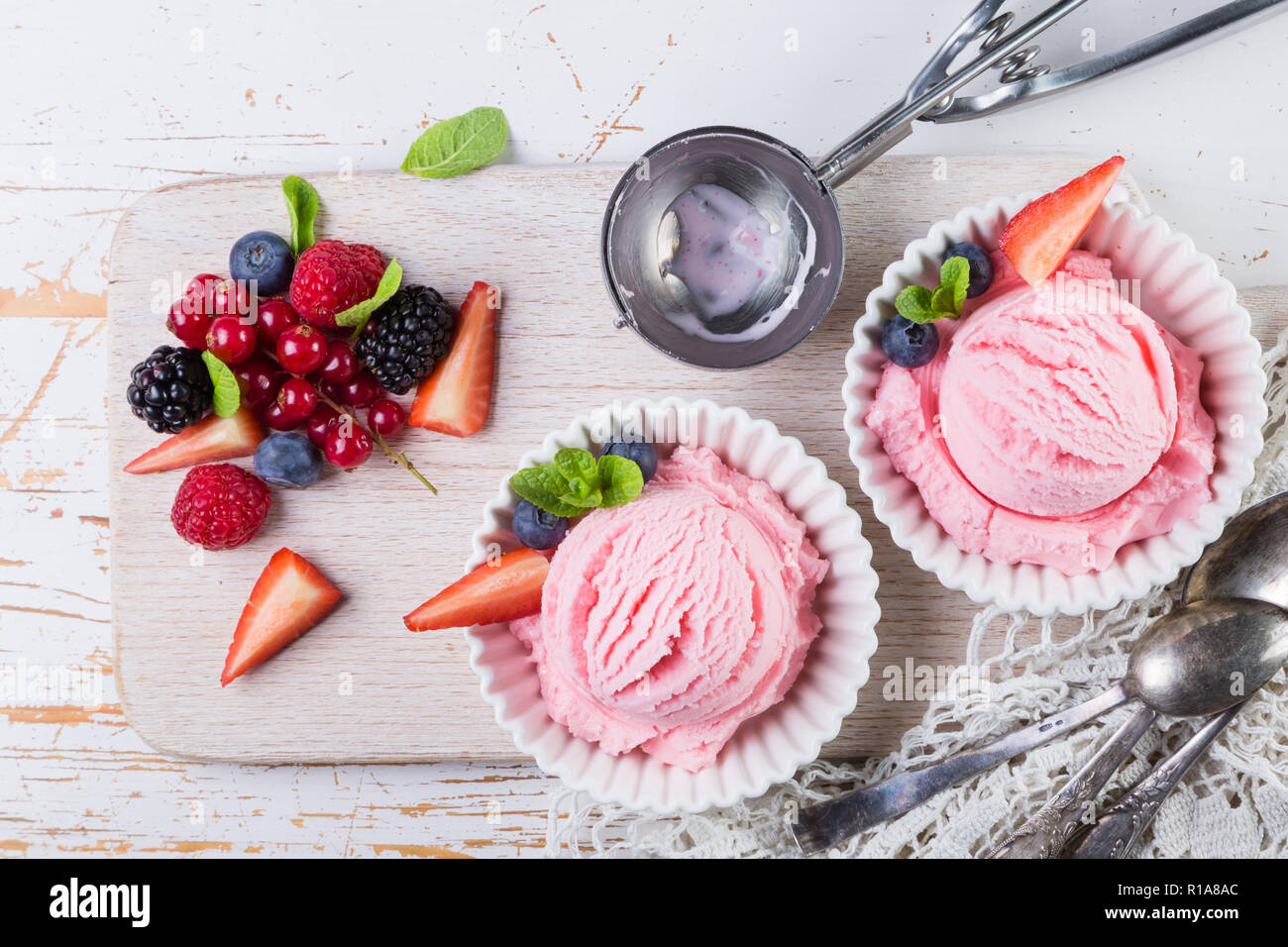 Berry ice cream with fresh fruits Stock Photo - Alamy