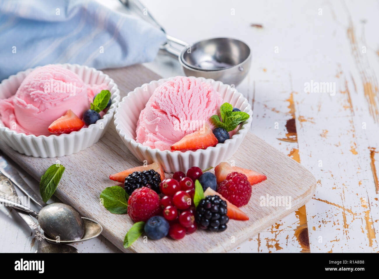 Berry ice cream with fresh fruits Stock Photo - Alamy