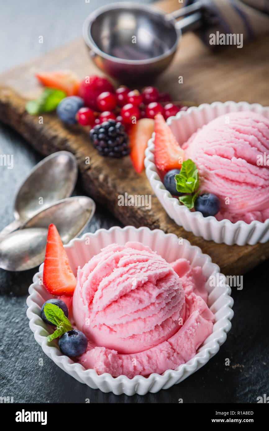 Berry ice cream with fresh fruits Stock Photo - Alamy