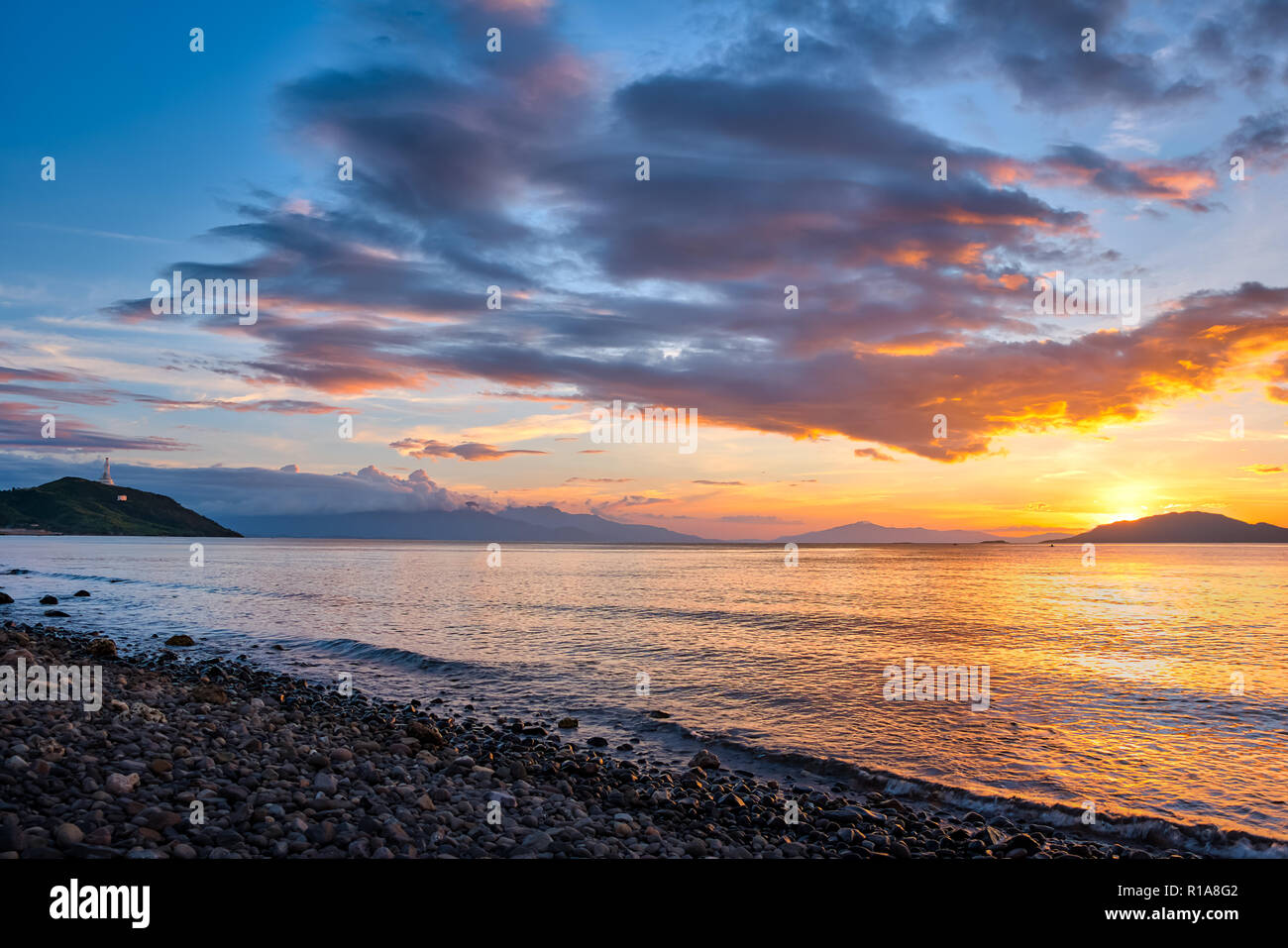 Scenic sunset at the shore of Batangas, Philippines Stock Photo - Alamy