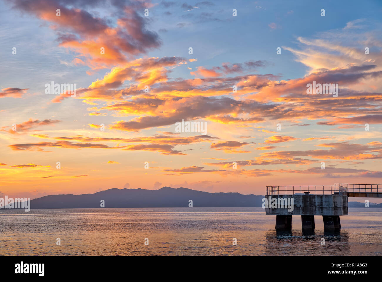 Scenic sunset at the shore of Batangas, Philippines Stock Photo - Alamy