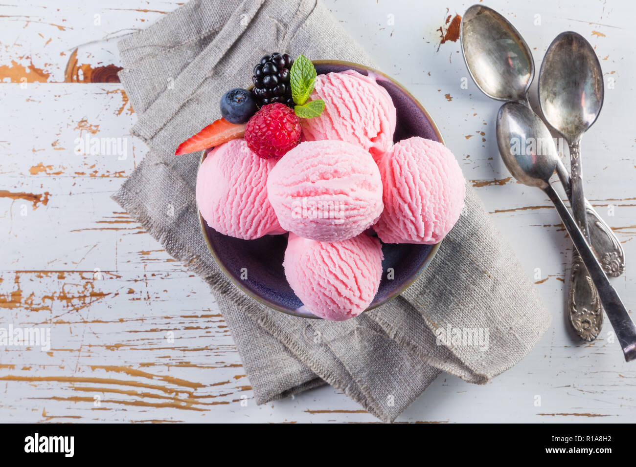 Berry ice cream with fresh fruits Stock Photo - Alamy