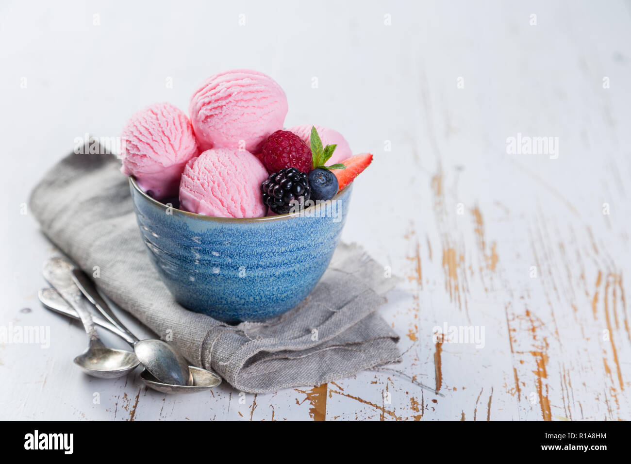 Berry ice cream with fresh fruits Stock Photo - Alamy